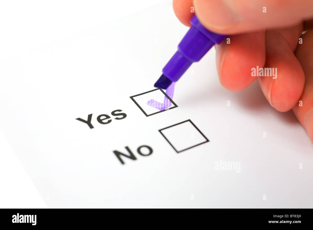 Hand with marker filling questionnaire on the white background Stock ...