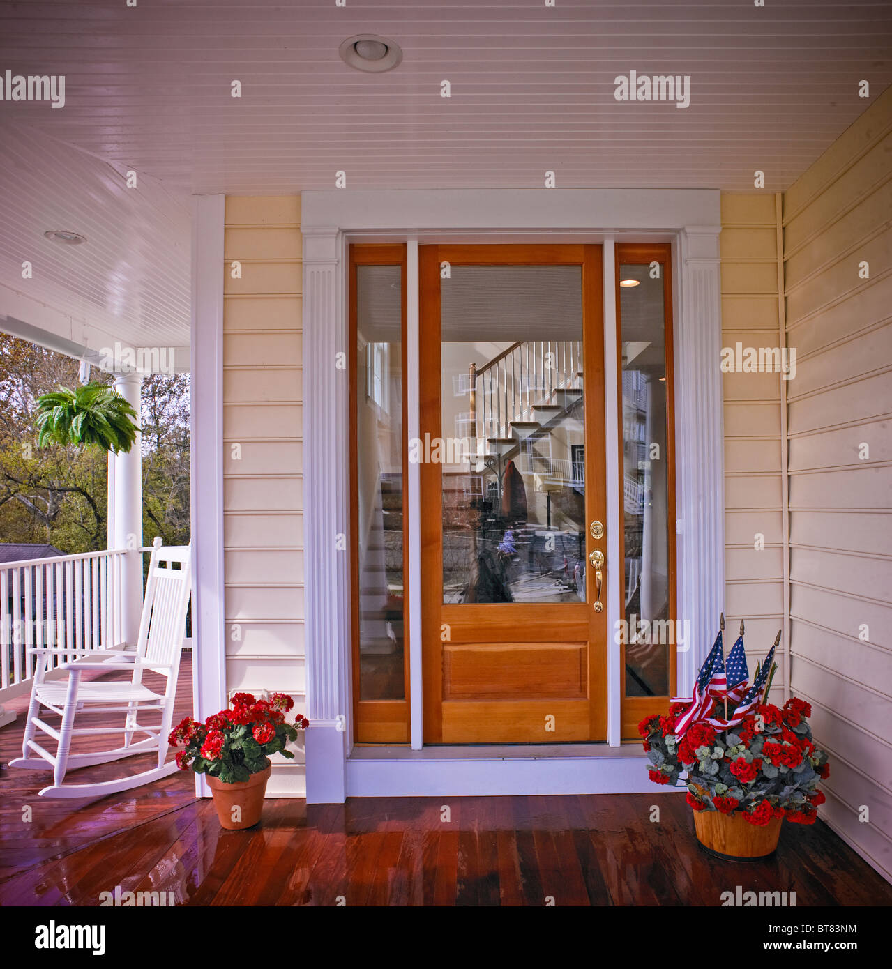 Rocker front porch door Stock Photo - Alamy