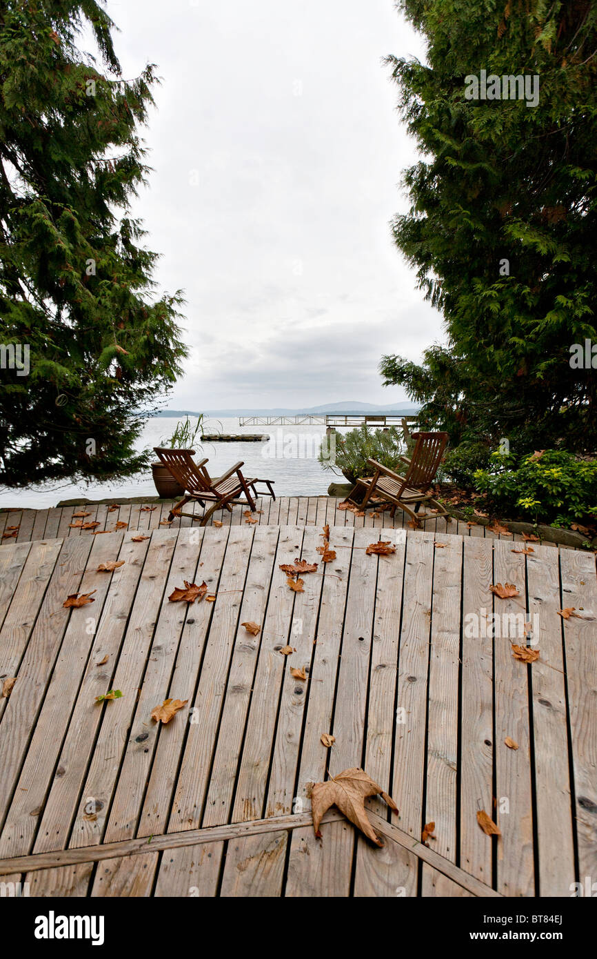 Two chairs by the ocean Stock Photo - Alamy