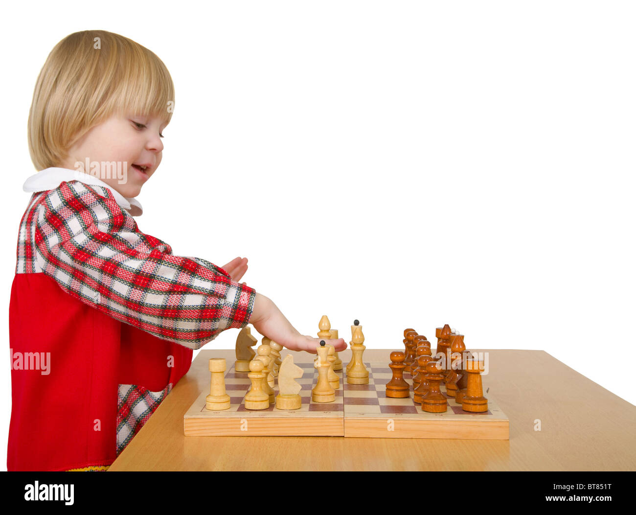 Little girl play chess on the white background Stock Photo - Alamy