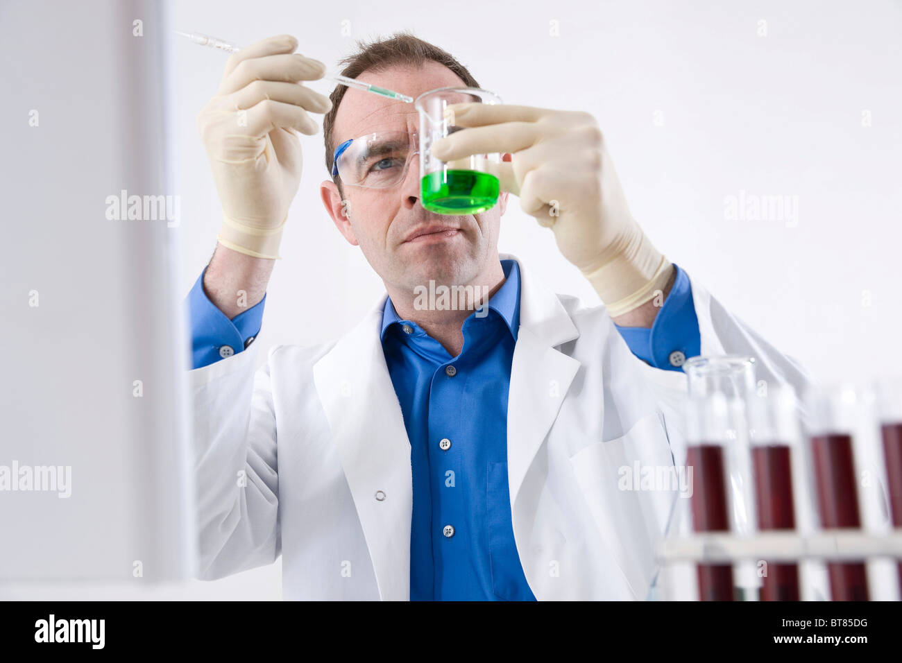 Man working on an experiment in a laboratory Stock Photo - Alamy