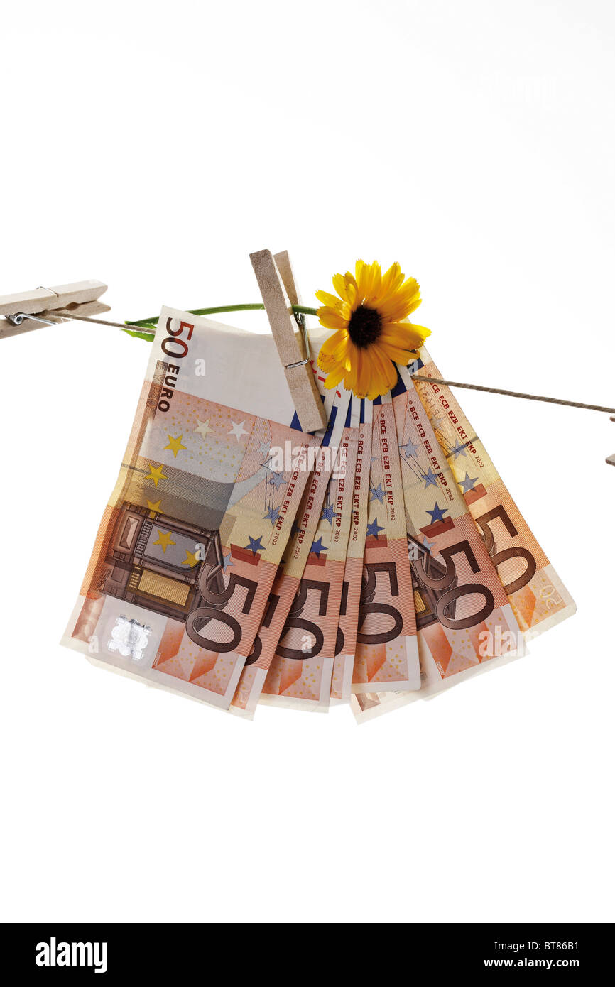Forged euro banknotes on a clothesline Stock Photo - Alamy