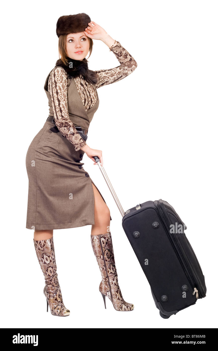 Young beautiful woman with a suitcase. Isolated on white Stock Photo ...