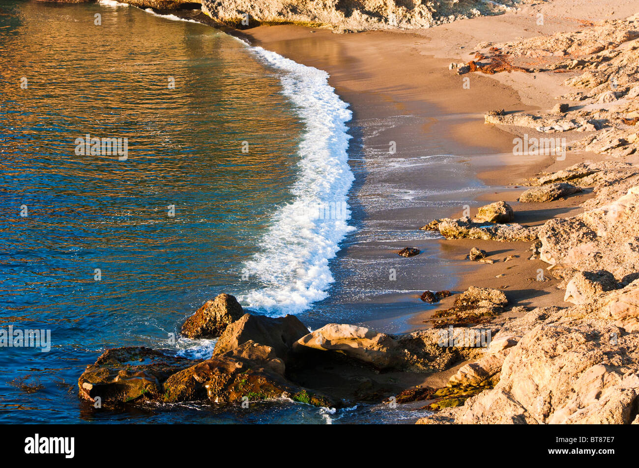 Evening light on surf at Headland Cove, Point Lobos State Reserve ...