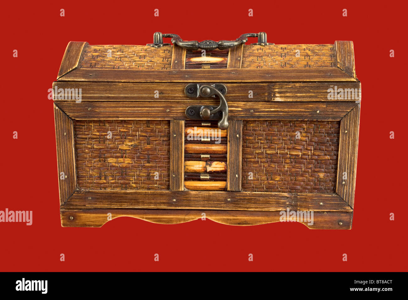 Ancient wooden chest on the red background Stock Photo - Alamy