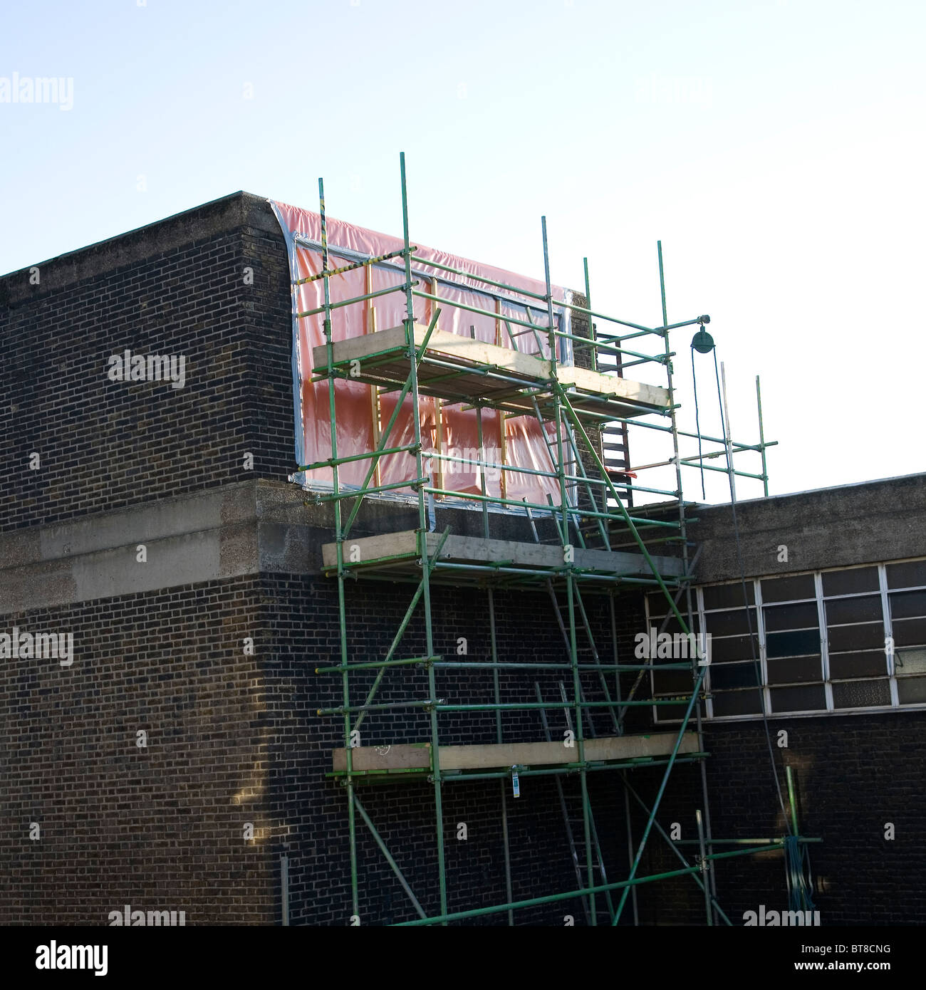 Scaffolding on building Stock Photo - Alamy