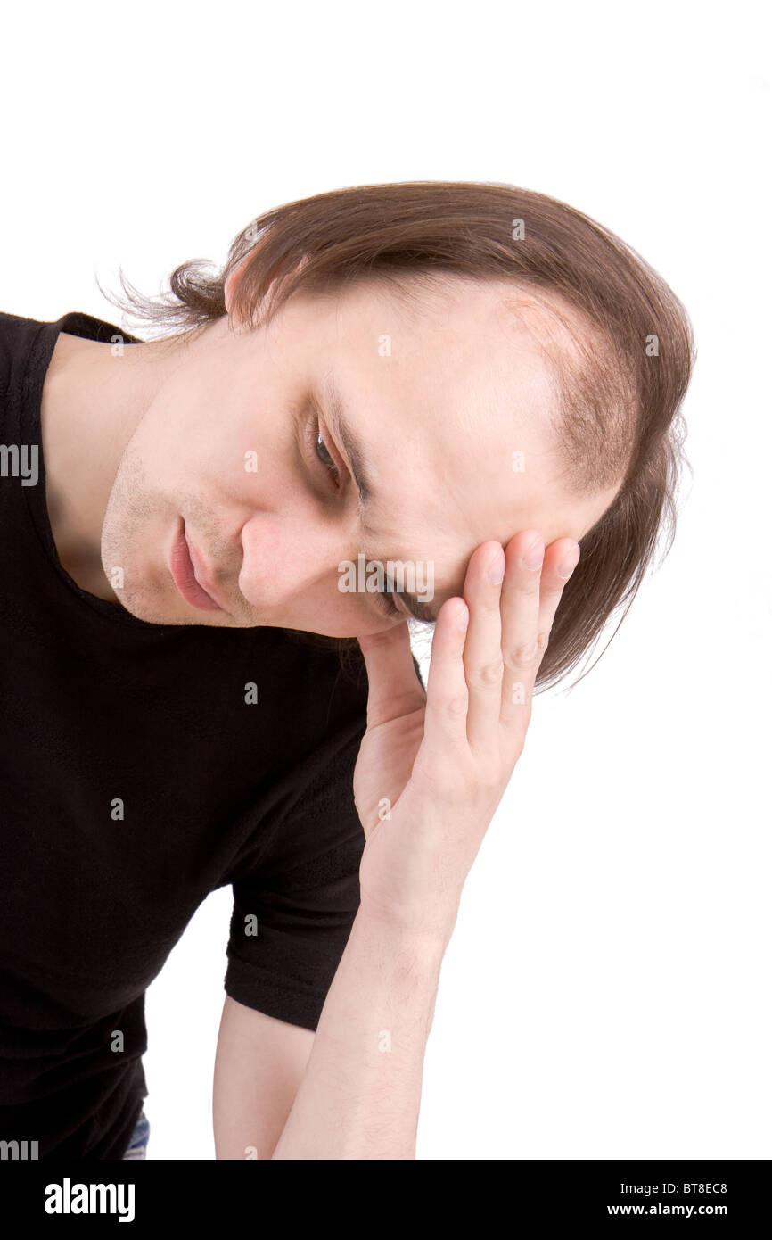 The man keeps a hand for a sick head Stock Photo - Alamy