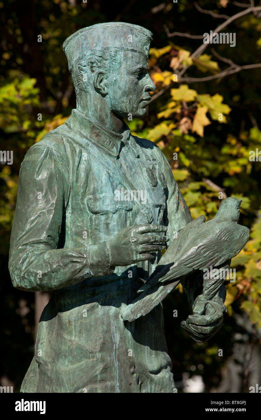 Statue of a Red Army soldier holding a falcon at the Fallen Monument ...