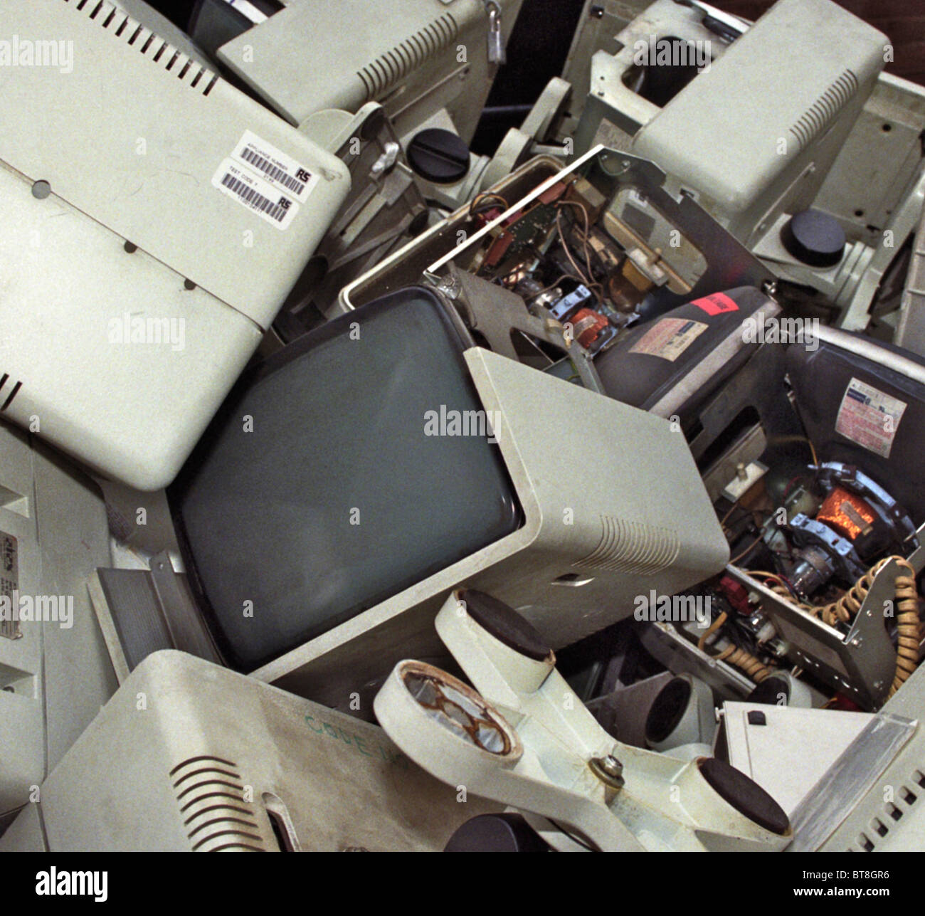 Redundant computer equipment in a dump skip Stock Photo - Alamy