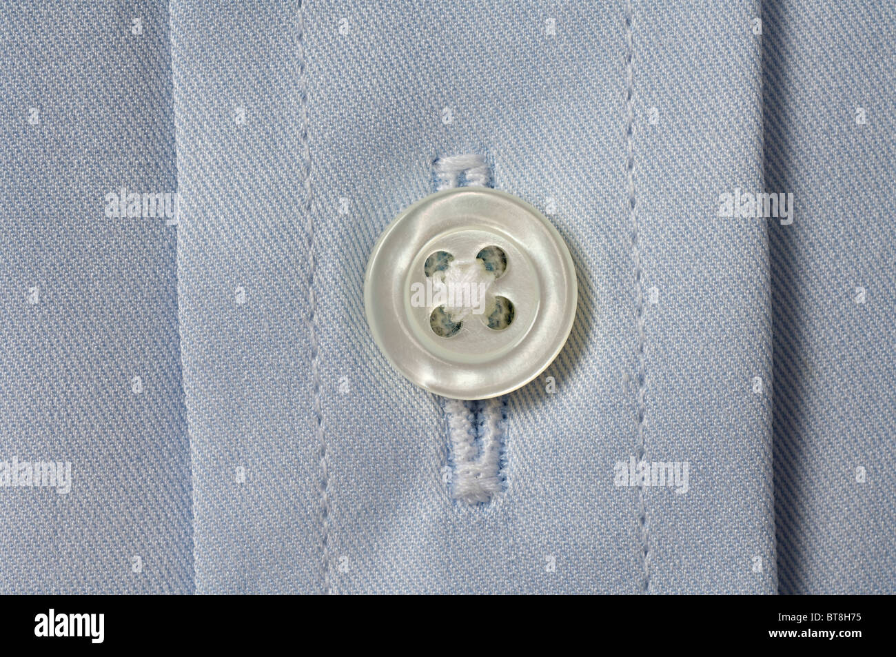 Close-up of a shirt and button Stock Photo - Alamy