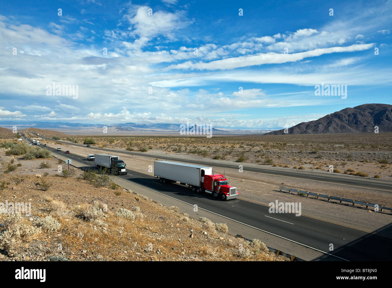 I-15 freeway deep in the center of California's Mojave desert between ...