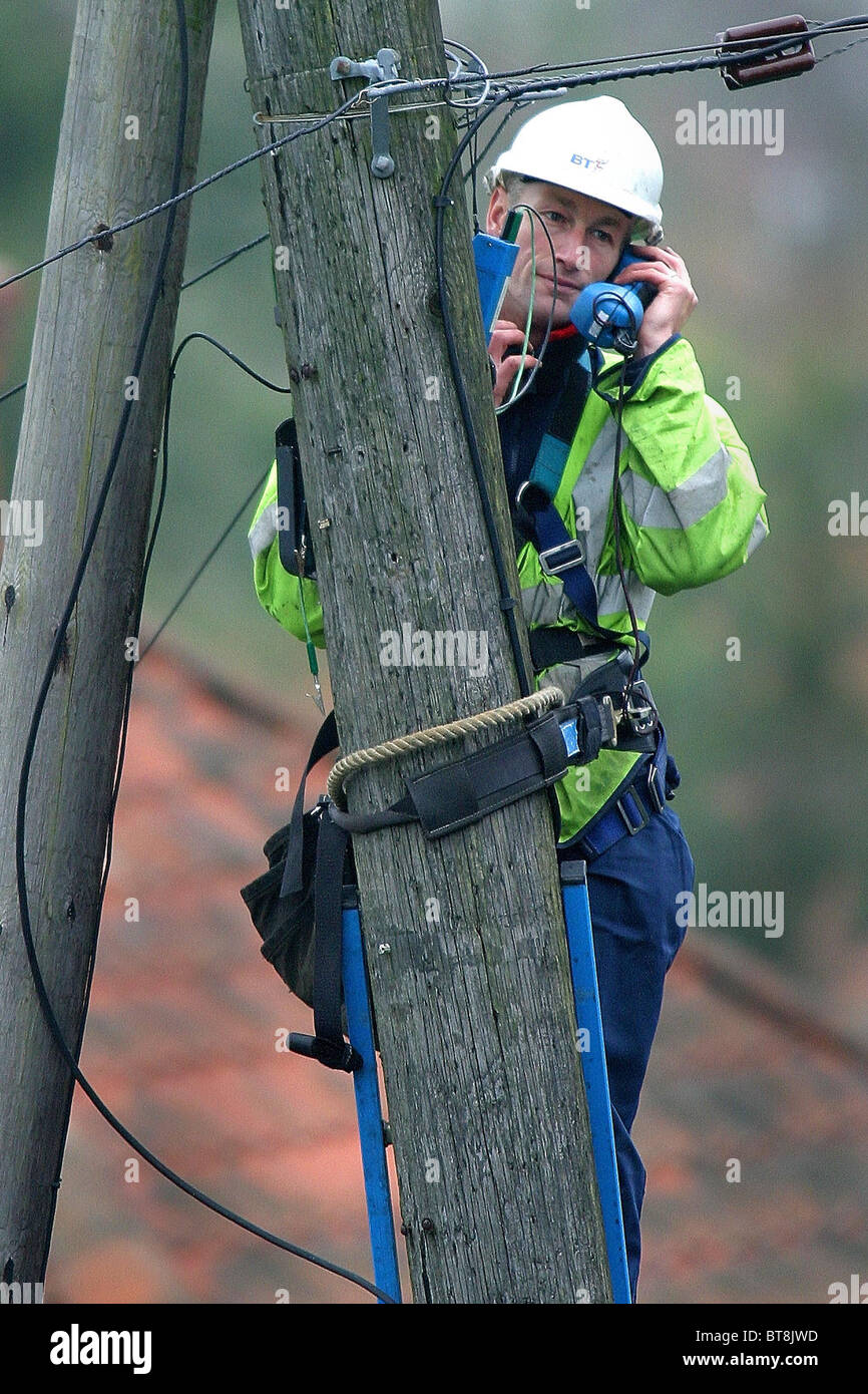 Telephone engineer working up a telegraph pole. Picture by James ...