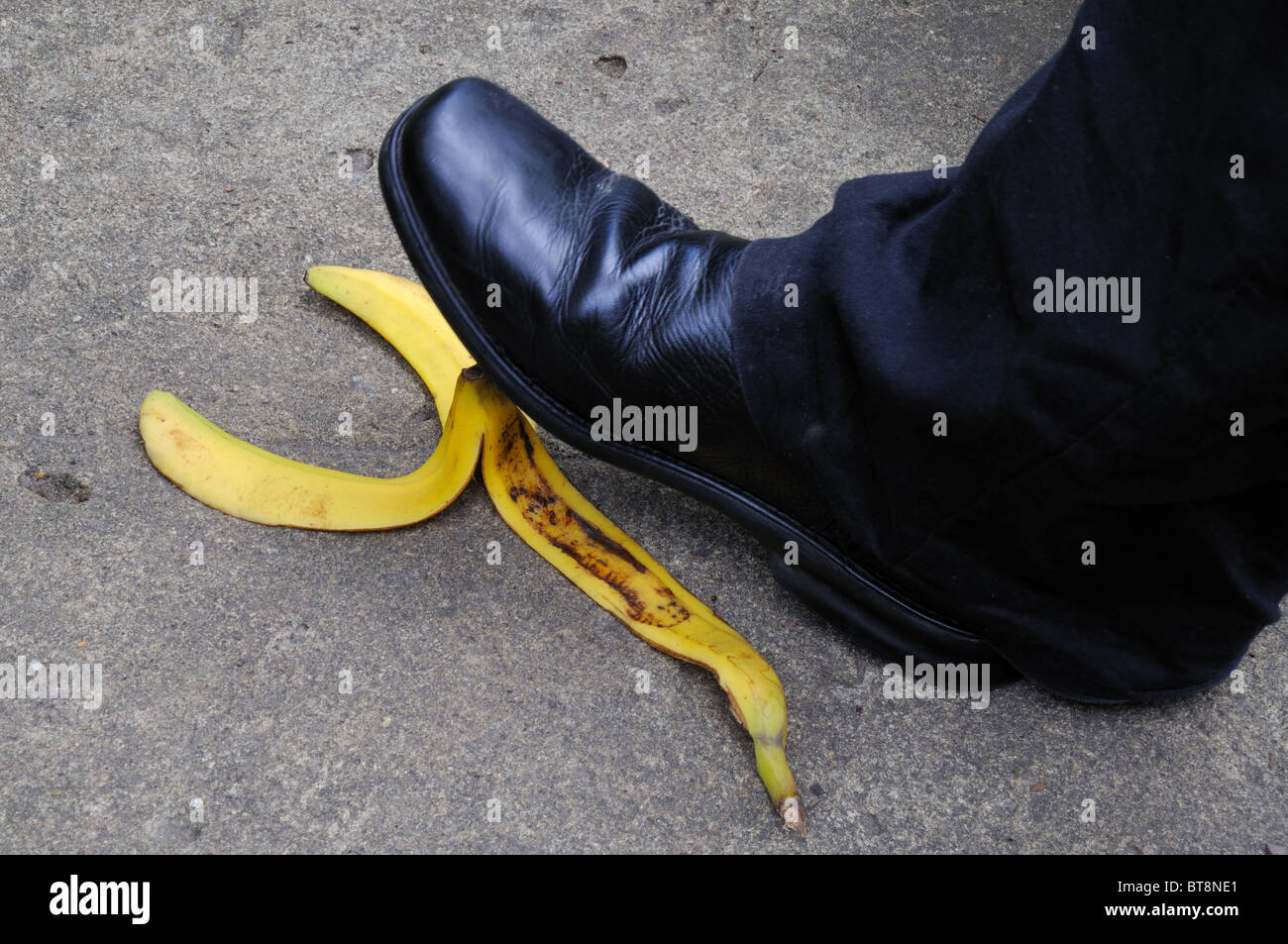 stepping on banana skin Stock Photo - Alamy