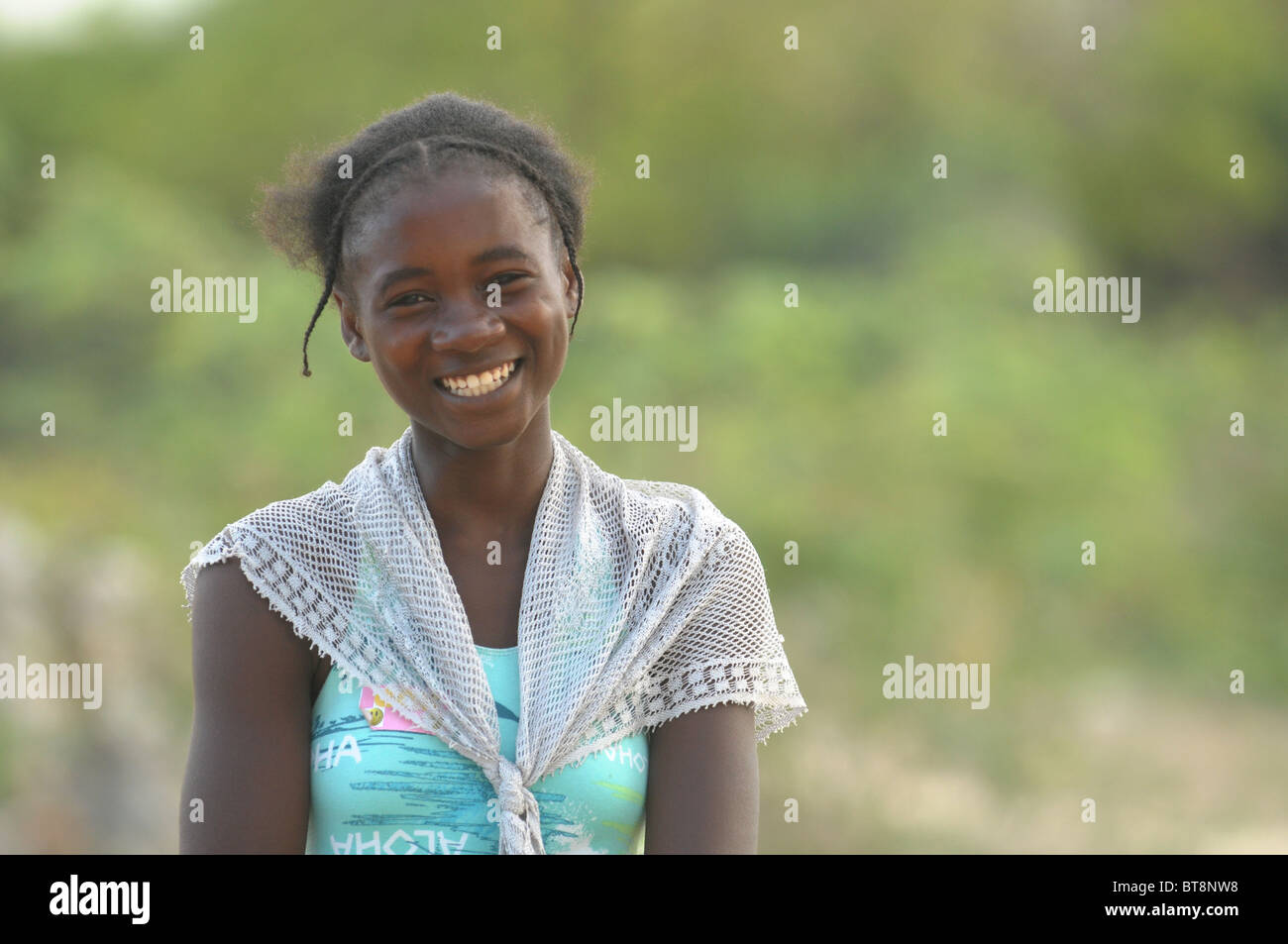 Happy smiling young happy Haitian girl Stock Photo - Alamy