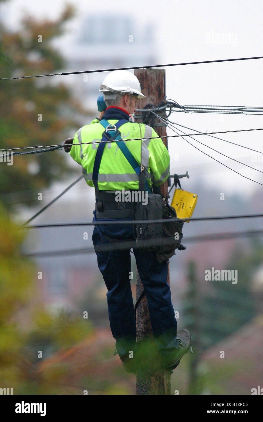 Telephone engineer working up a telegraph pole. Picture by James ...