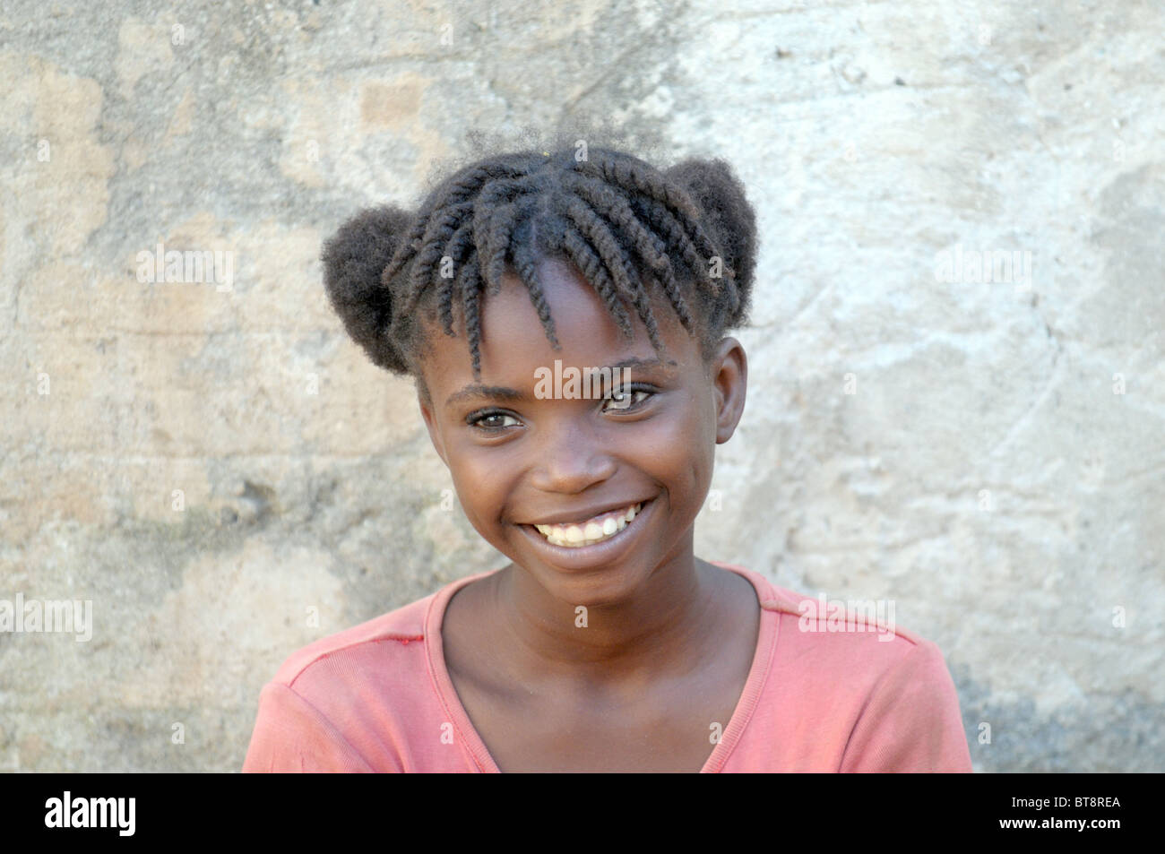Young happy Haitian girl Stock Photo - Alamy
