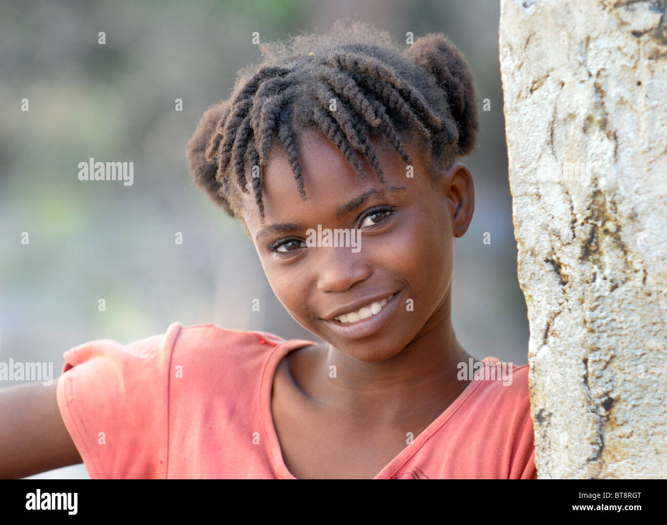 Young happy Haitian girl Stock Photo - Alamy