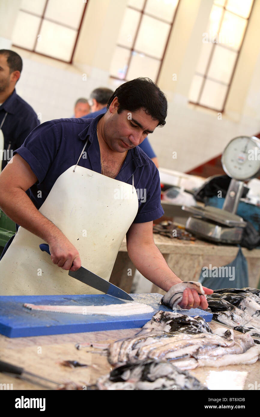 fishmonger at work Fish Market Funchal Madeira Stock Photo - Alamy