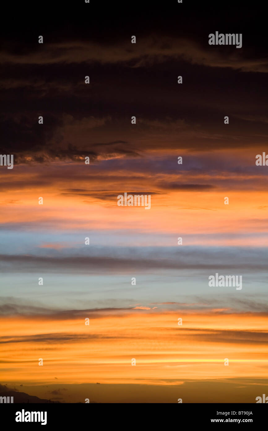 Golden sunset clouds background Stock Photo - Alamy