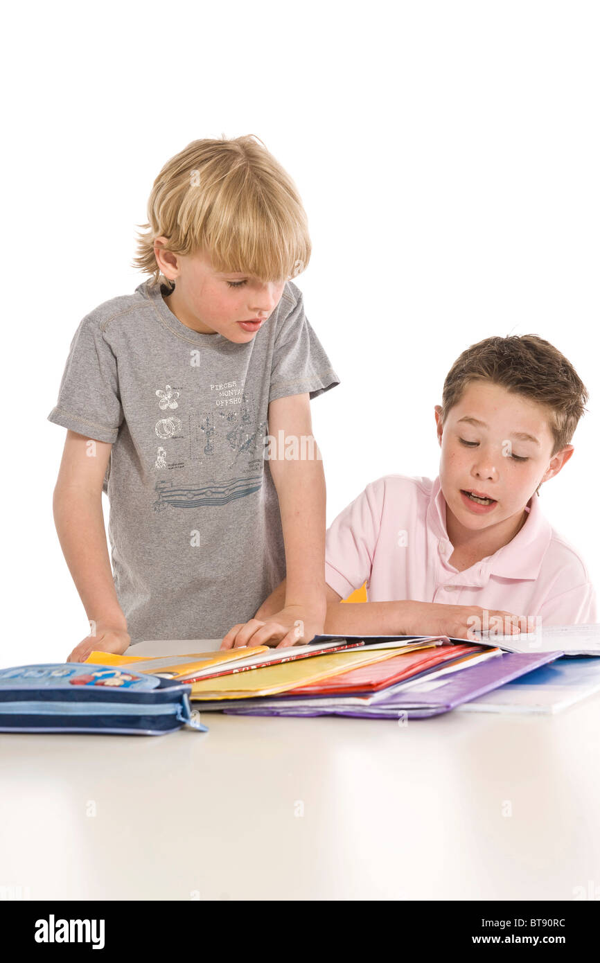 Two boys doing their homework Stock Photo - Alamy