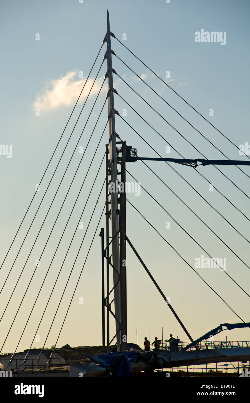 High reach access platform (cherry picker) working on a cable stayed ...