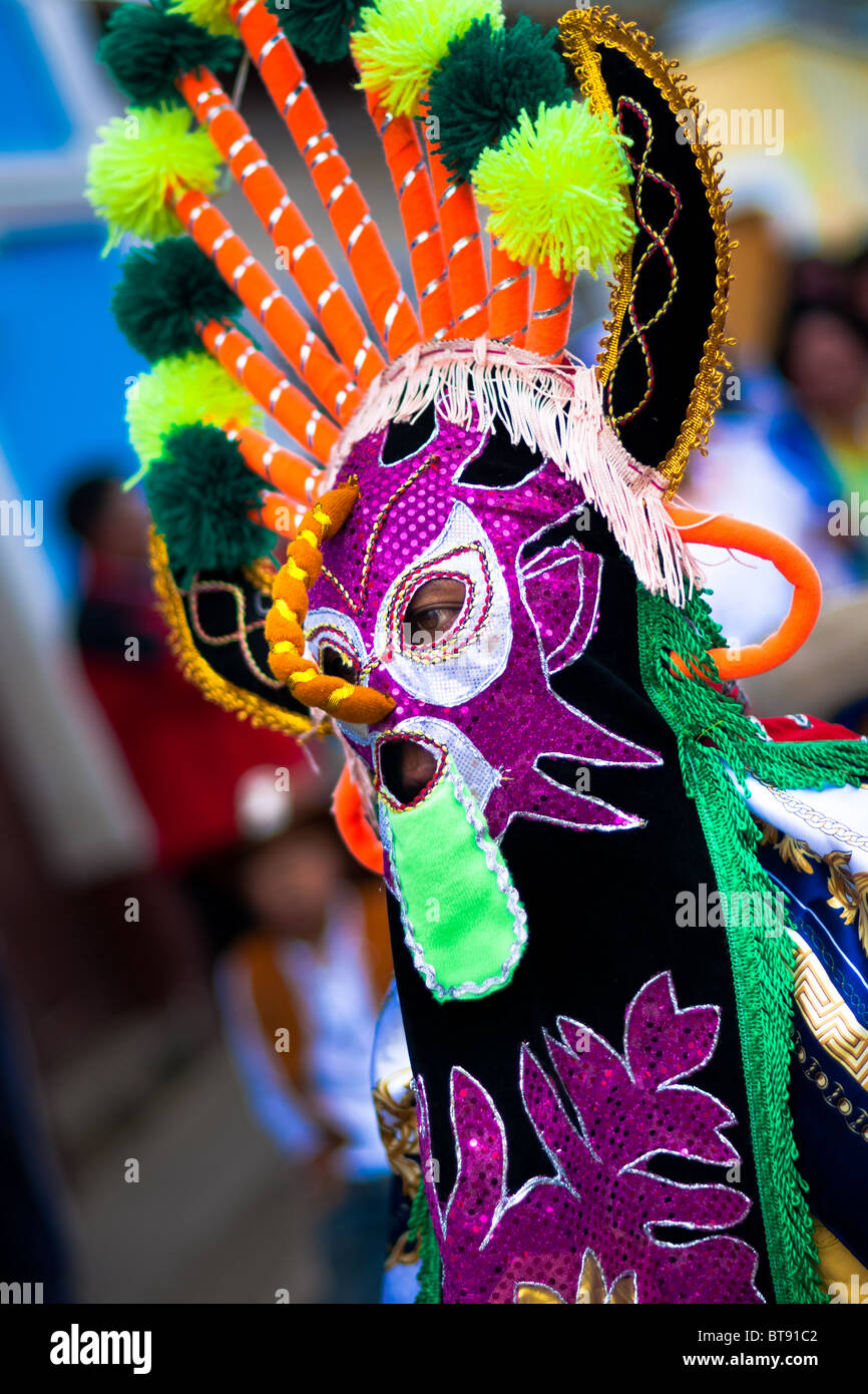 A man dancer in a colorful costume performs Aya Uma during the Inti ...