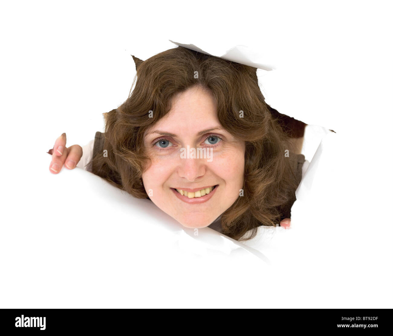 Portrait young woman stick out from hole in paper Stock Photo - Alamy