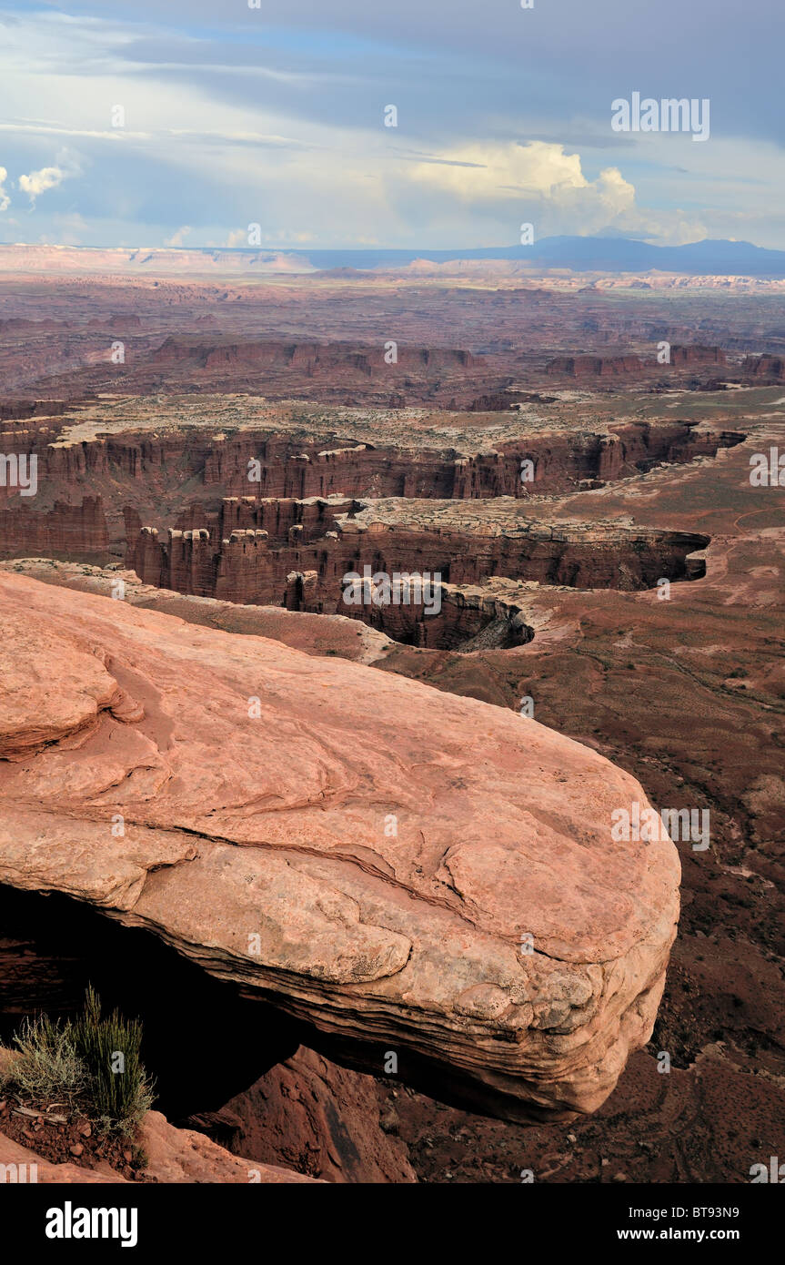 Giant Boulder Overhangs Carved Landscape Stock Photo - Alamy
