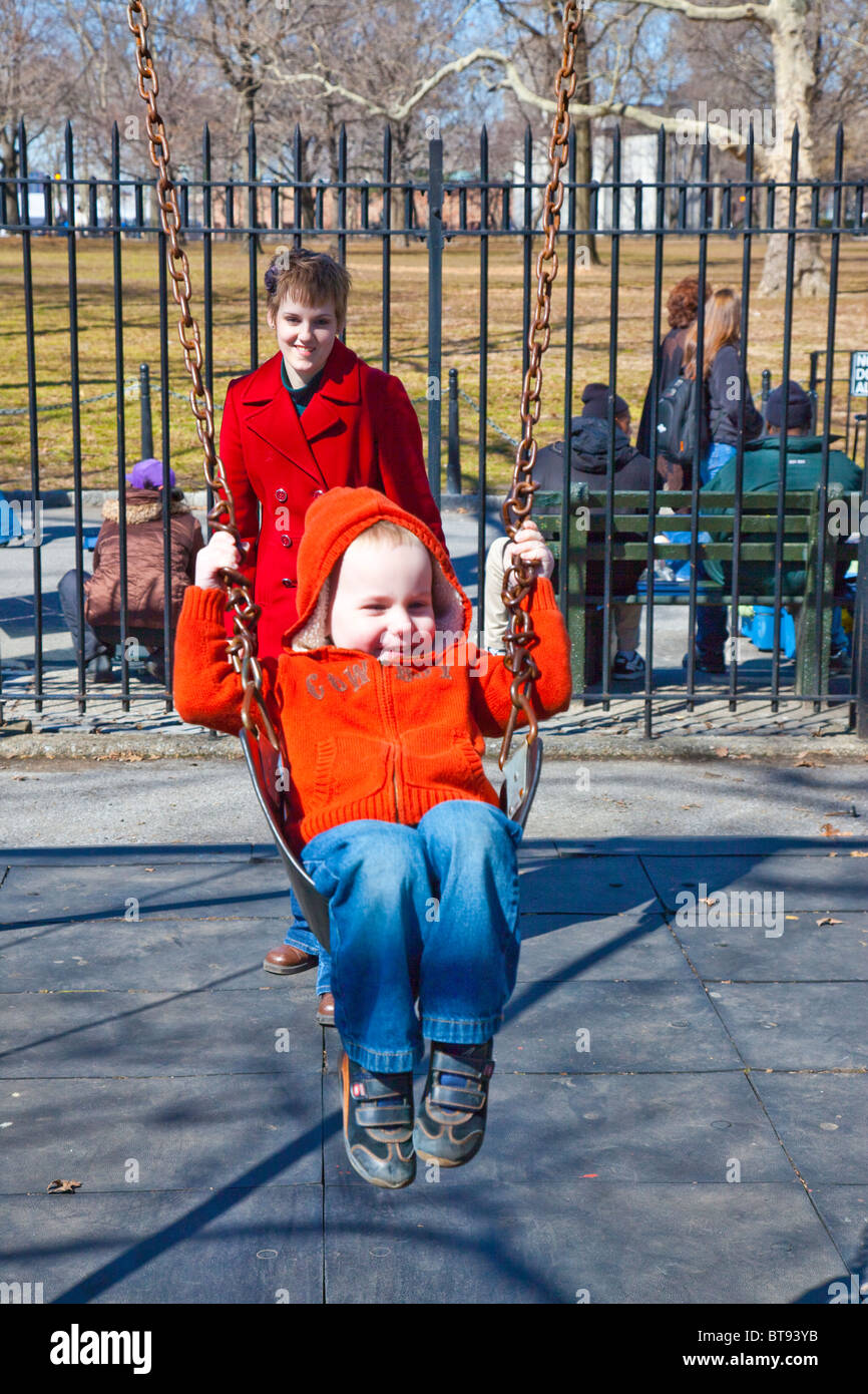 Child swing push hi-res stock photography and images - Alamy