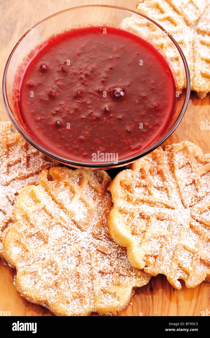 Waffles and waffle toppings, raspberry puree Stock Photo - Alamy