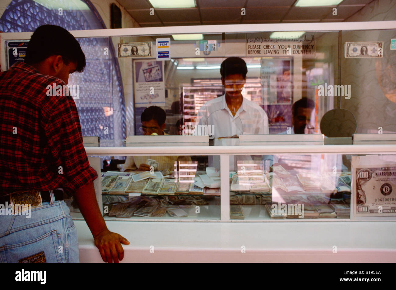 Sharjah UAE Money Exchange People At Counter Stock Photo - Alamy