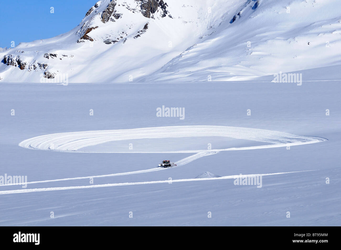 Preparations of cross-country tracks on the snow field of the Plaine ...