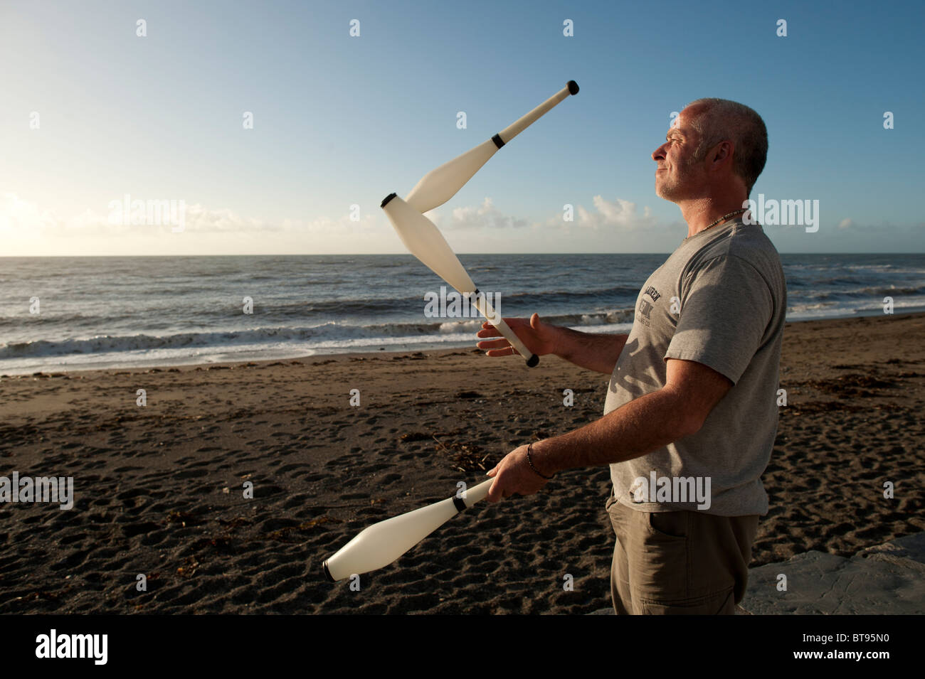 A Aberystwyth University student juggling with three clubs Aberystwyth ...