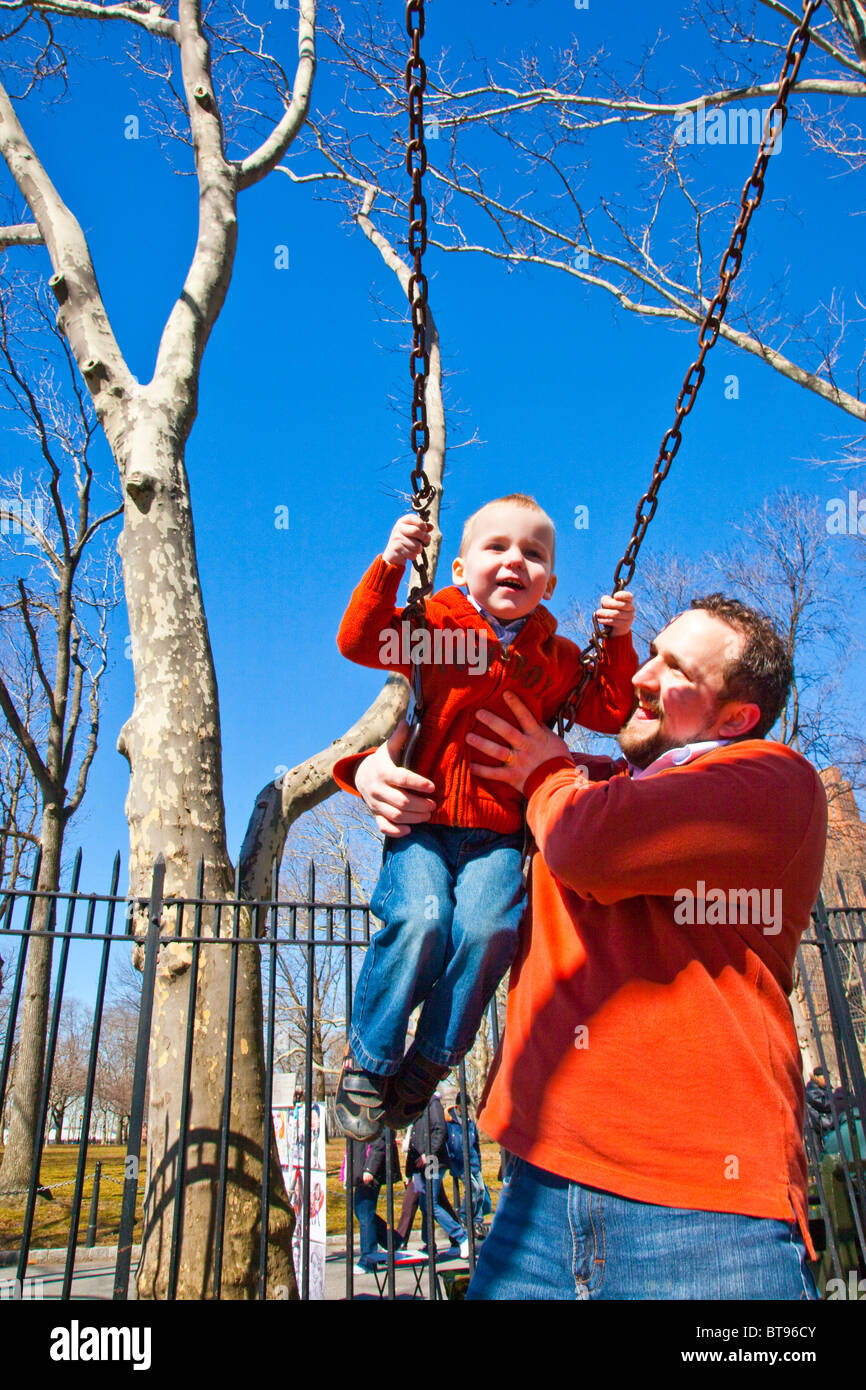 Child swing push hi-res stock photography and images - Alamy