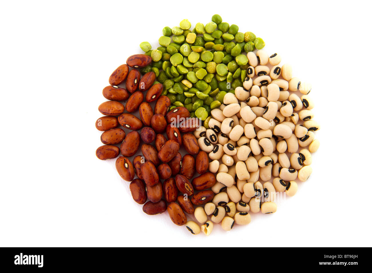Various dried legumes isolated over white background Stock Photo - Alamy