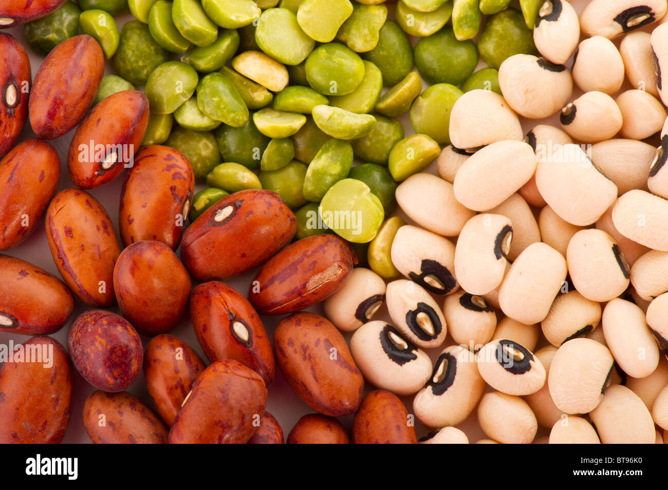 Various colorful dried legumes beans as background Stock Photo - Alamy