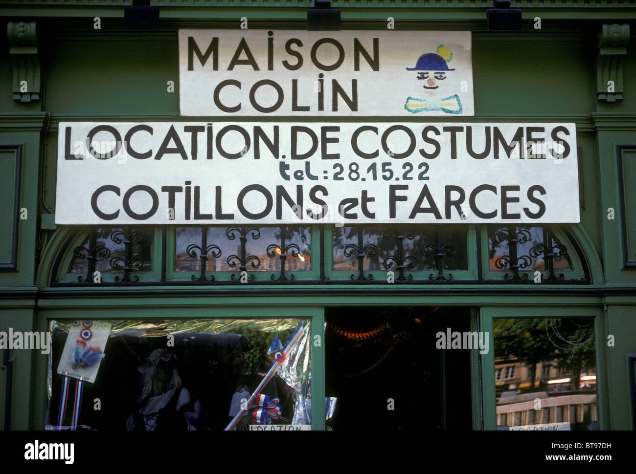 French language sign, sign, storefront, costumes, novelty store, Maison ...