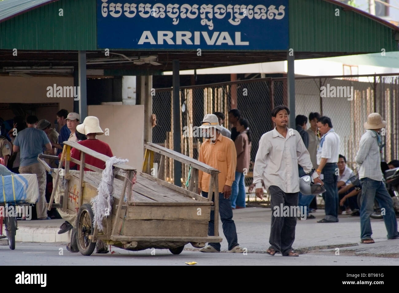 People are arriving at the international customs checkpoint at the ...