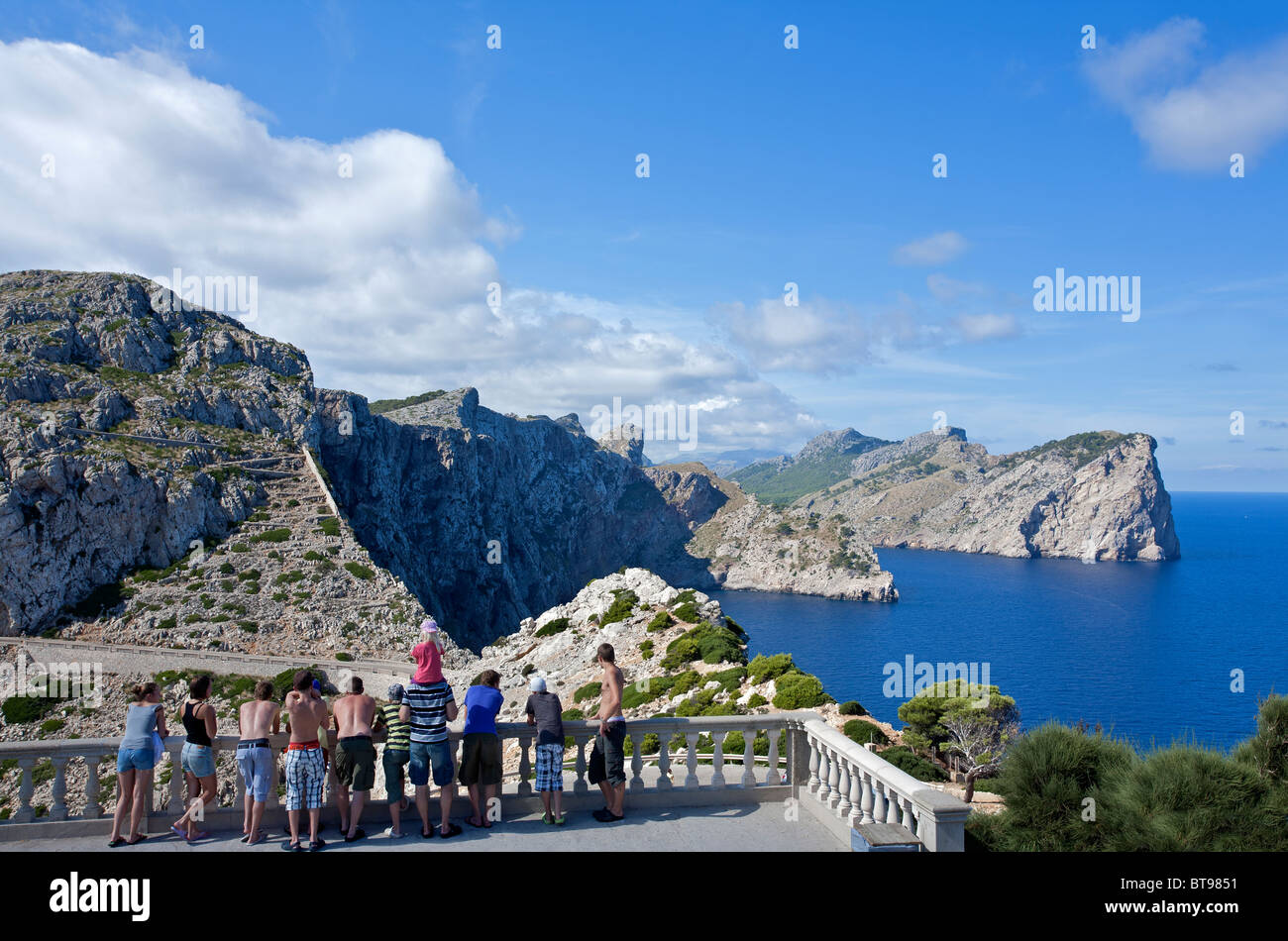 Tourists contemplating the landscape. Formentor lighthouse viewpoint ...