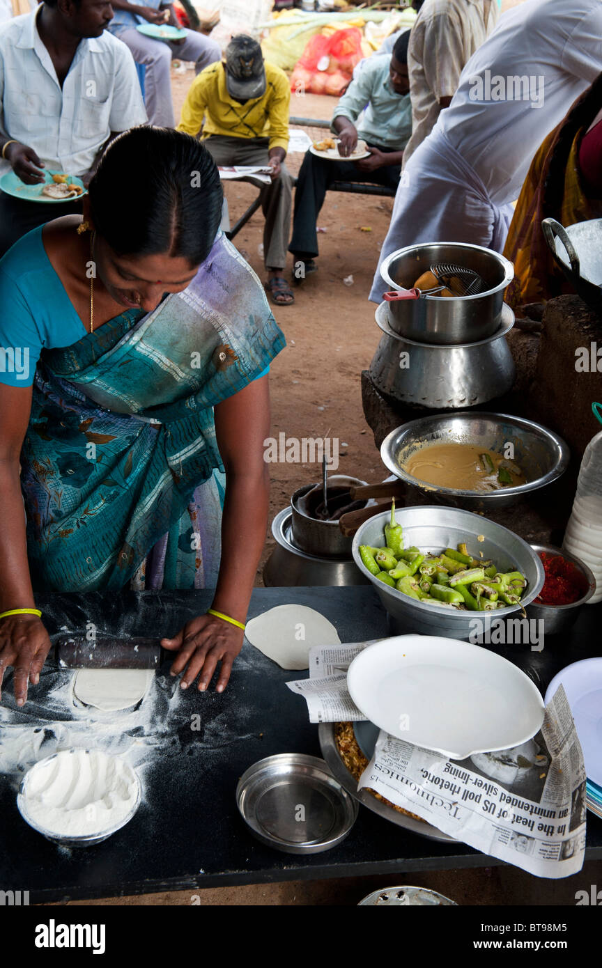 Women preparing roti hi-res stock photography and images - Alamy