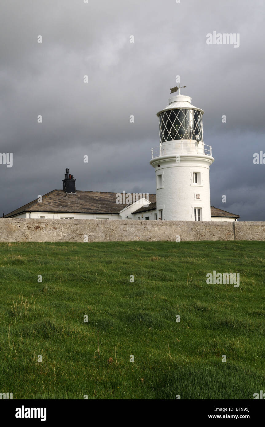 Dramatic stormy sky over St Bees Head Lighthouse Fleswick Bay Cumbria ...