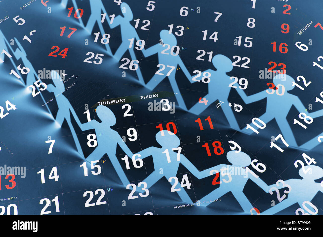 Paper Chain Dolls and Calendar Stock Photo - Alamy