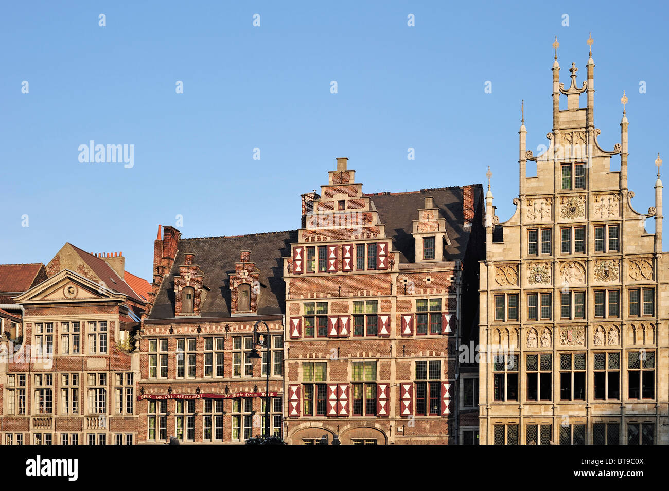Historical step-gabled houses at the Graslei / Grass Lane in Ghent ...