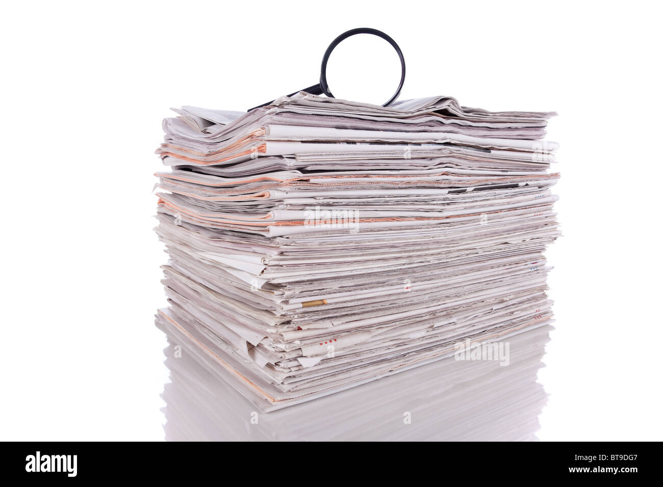 Reading newspaper magnifying glass hi-res stock photography and images ...