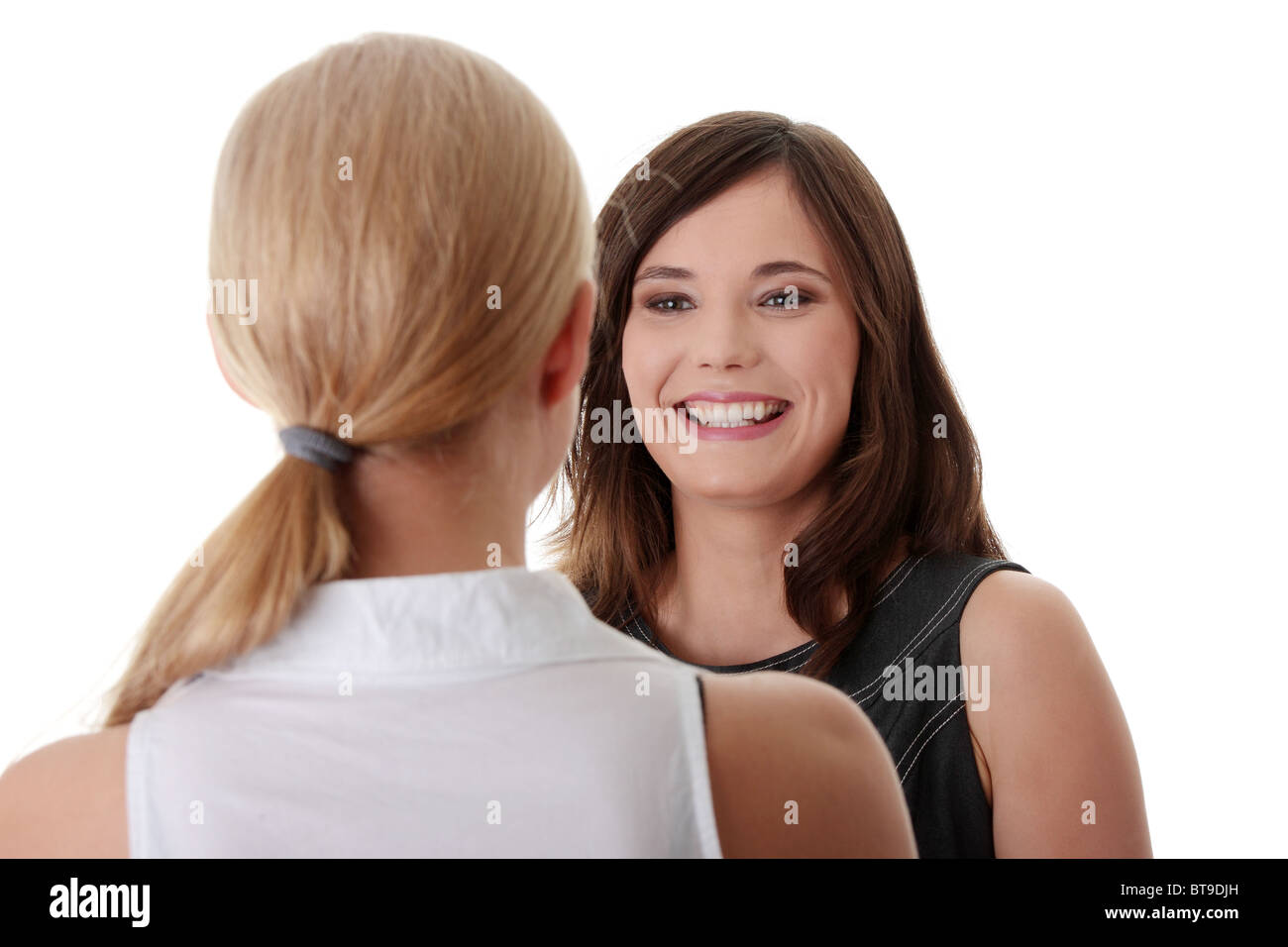 Two happy women isolated on white Stock Photo - Alamy