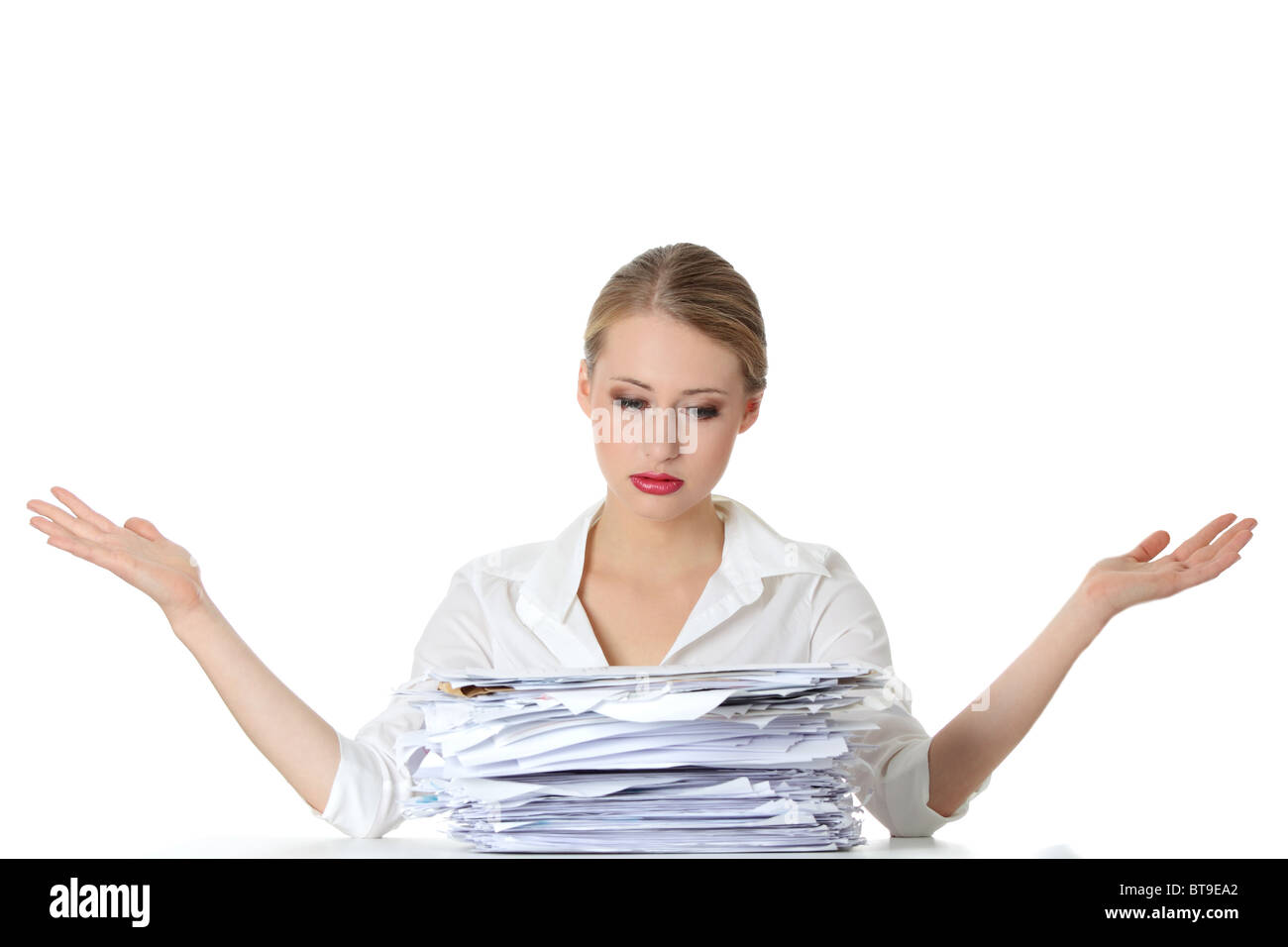 Overworked businesswoman isolated on white Stock Photo - Alamy
