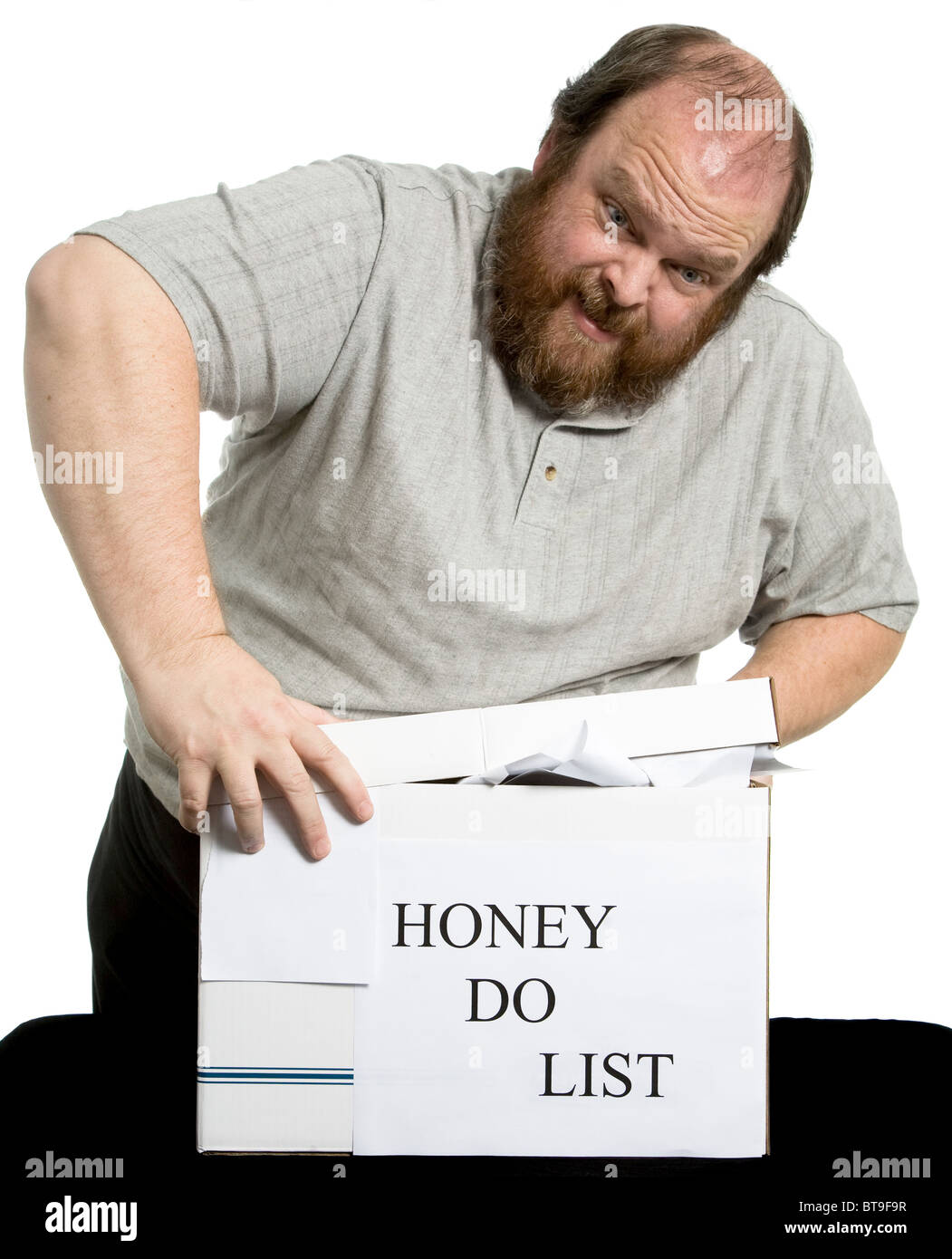 Trying to close the box Stock Photo - Alamy