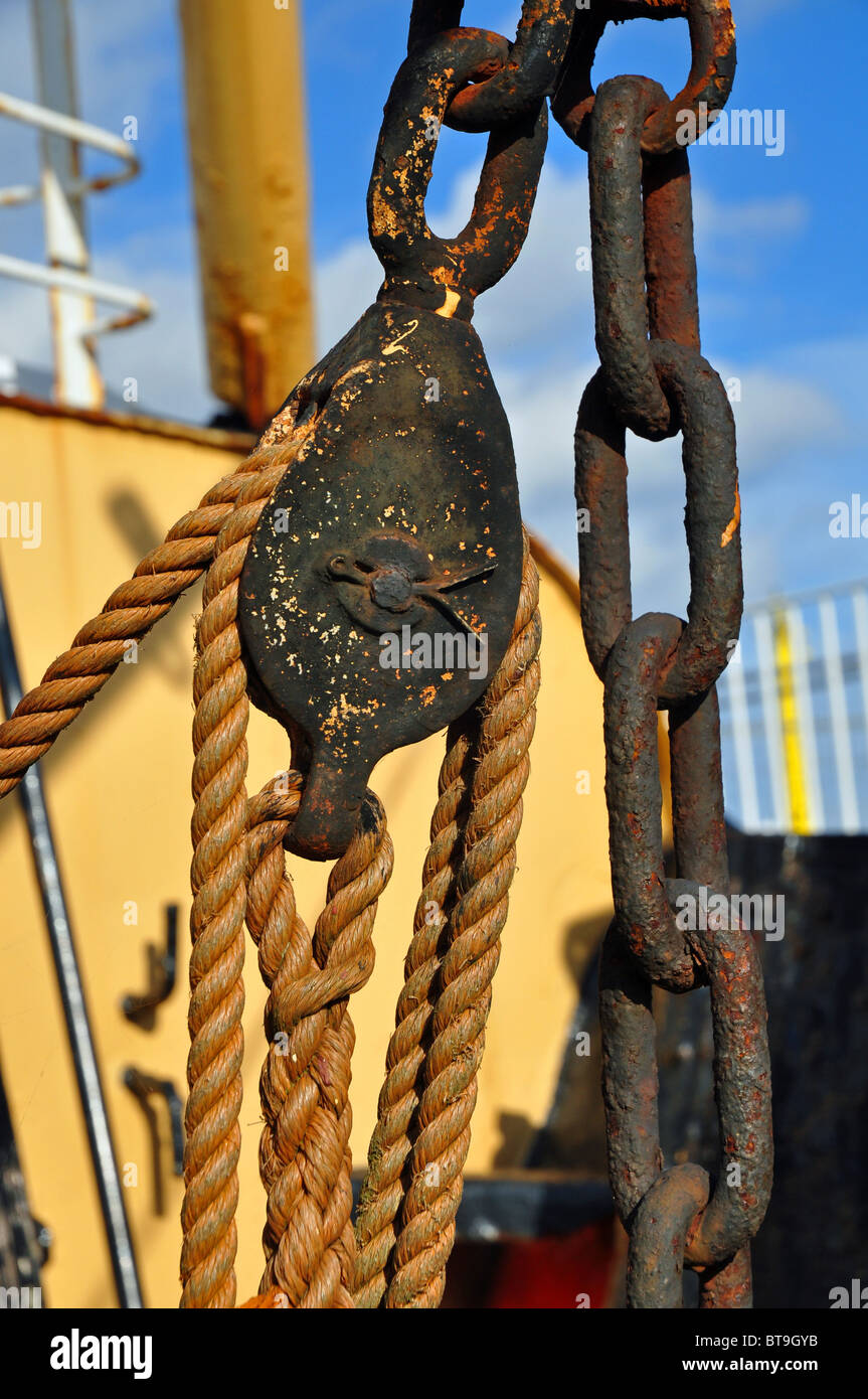 Lowestoft, Suffolk, England: chain rope and pulley aboard trawler ...