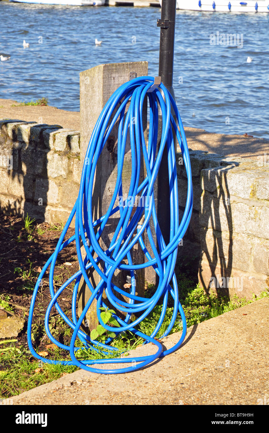 Lowestoft, Suffolk, England: coiled blue hose Stock Photo - Alamy