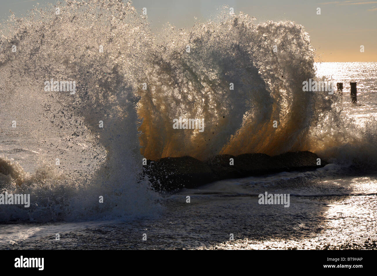 Wave crashes on beach hi-res stock photography and images - Alamy